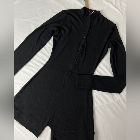 SKIMS | Pants & Jumpsuits | Skims Soft Lounge Ribbed Long Sleeve Onesie ...